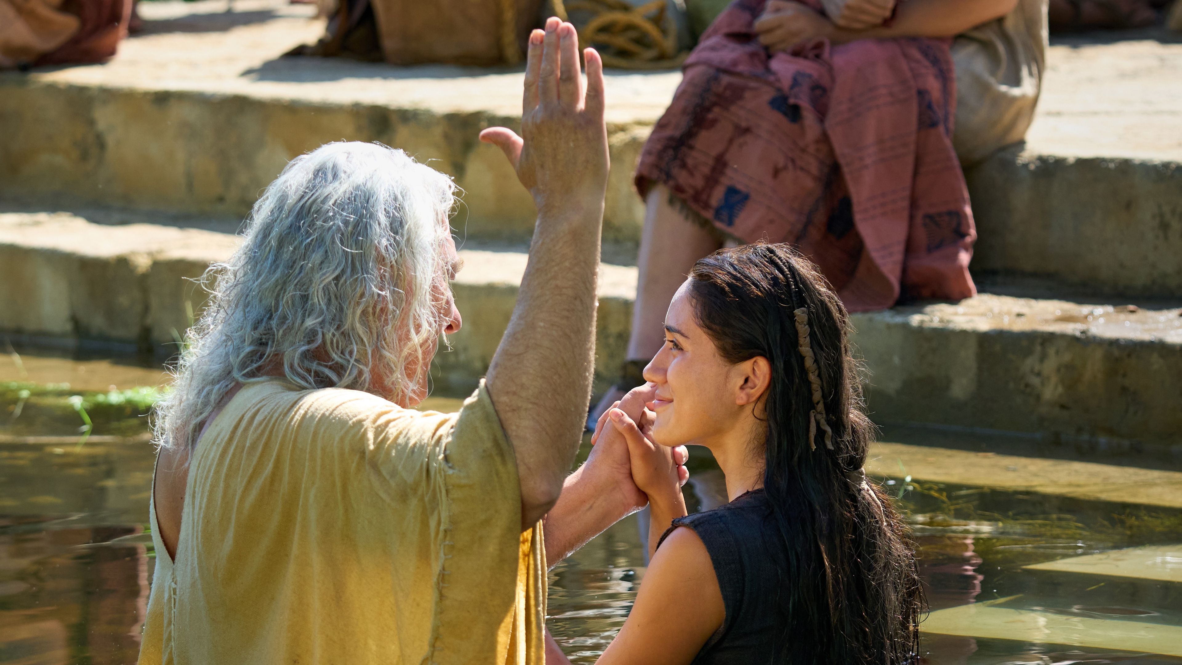 Nephi Baptizes the People