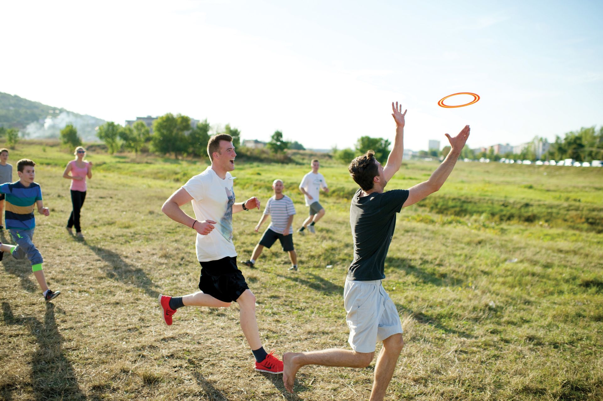 Youth Playing Frisbee