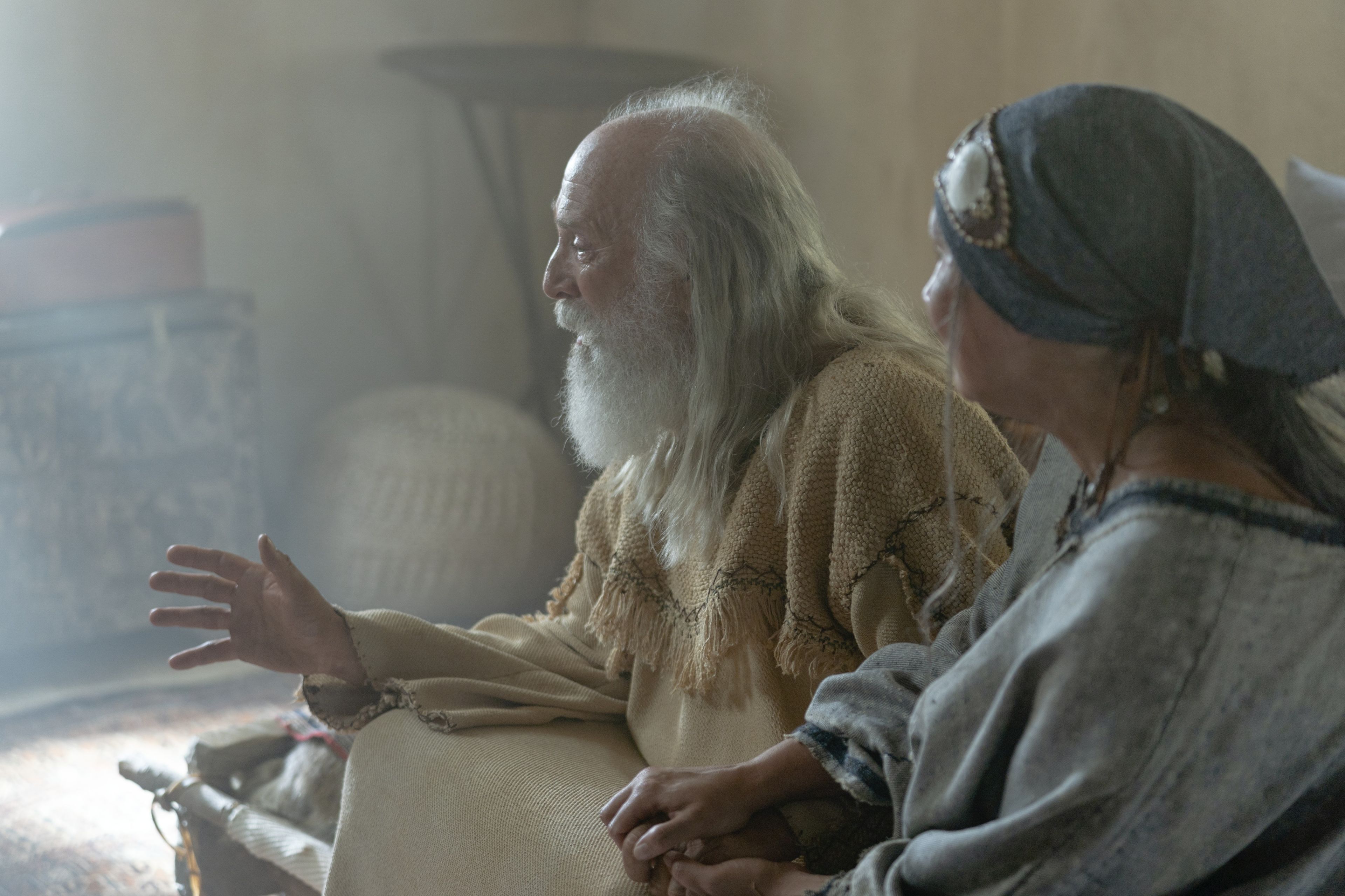 Lehi and Sariah teaching their family