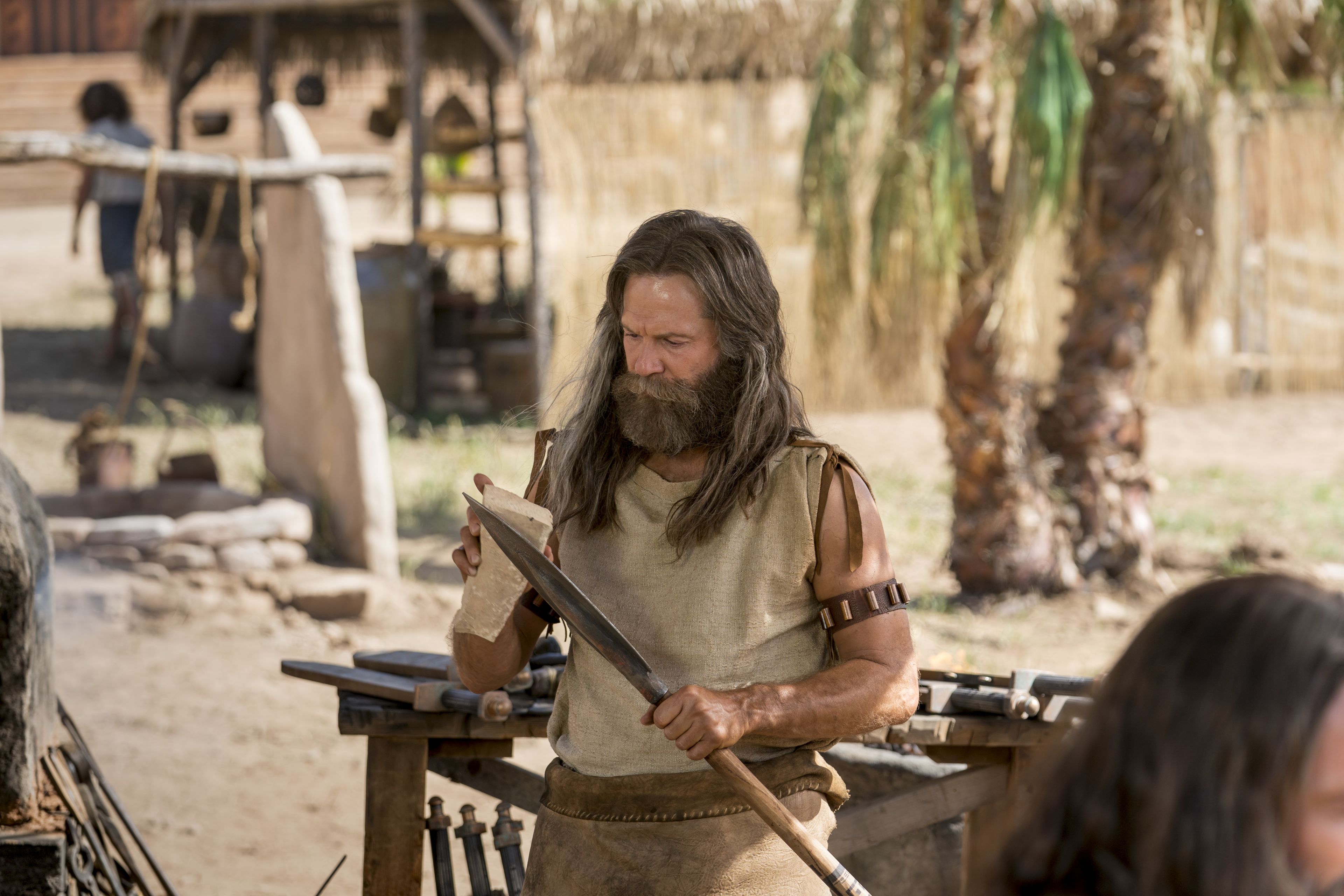 Jacob sharpening a spear