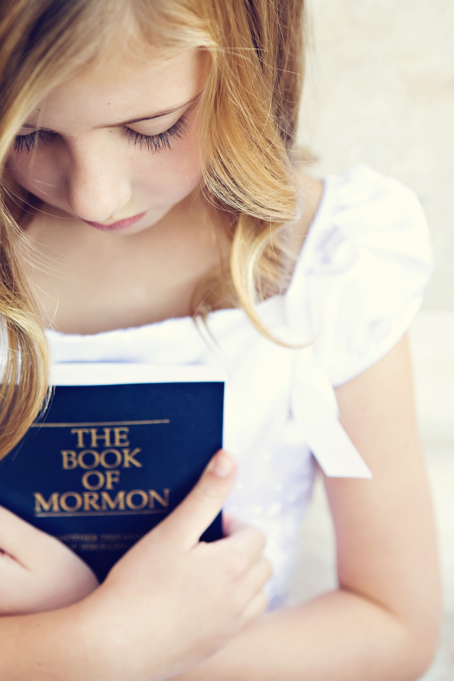 Family Reading the Book of Mormon
