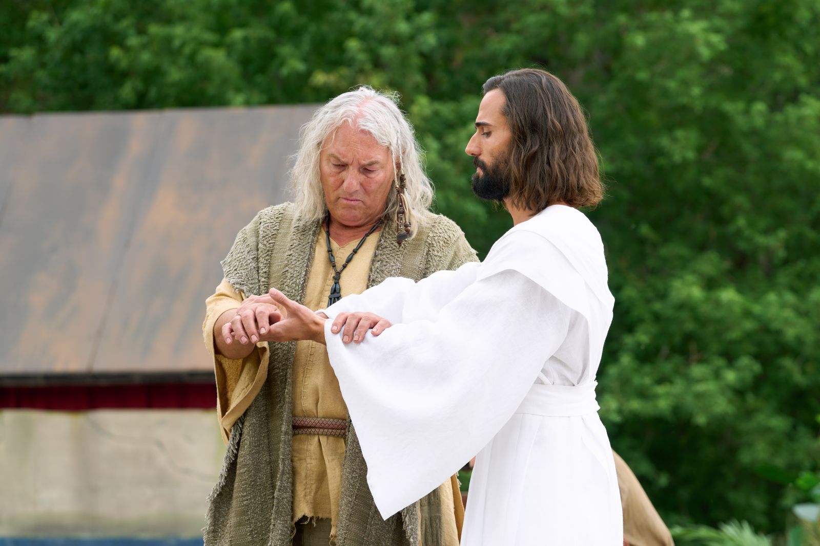 Nephi Baptizes the People