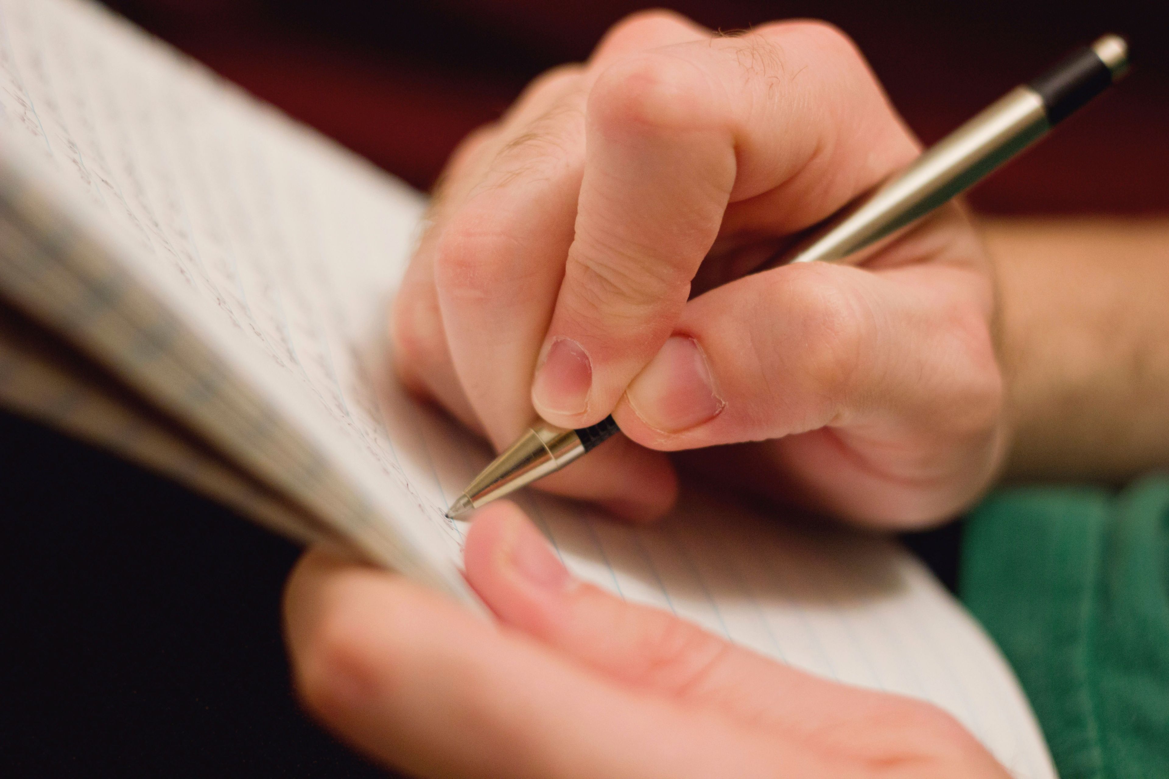 Writing in a Notebook